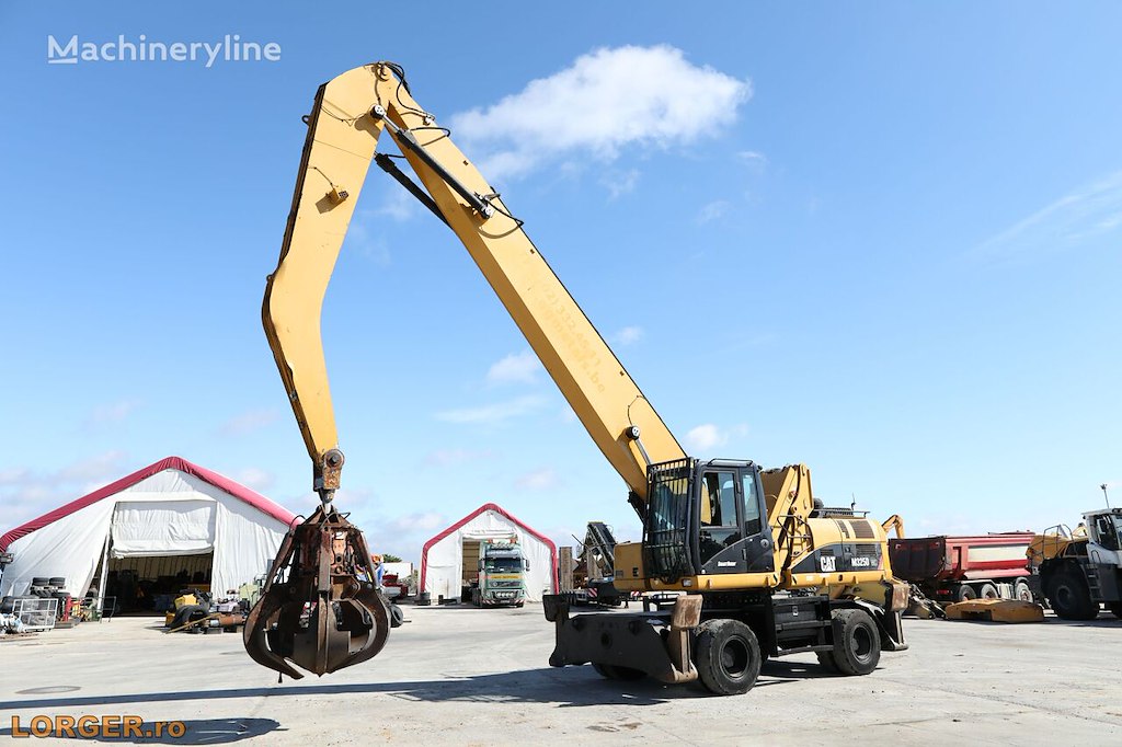 Caterpillar M325D MH bager za pretovar