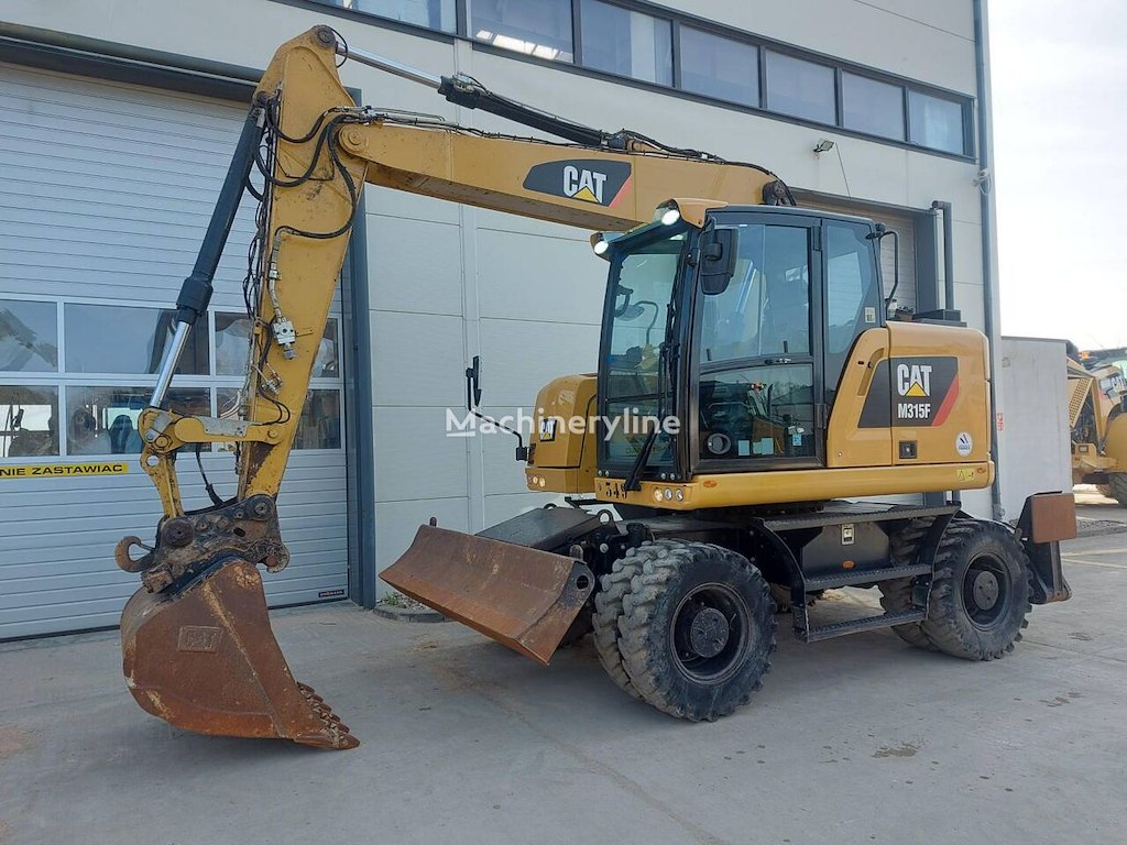 Caterpillar M315F bager točkaš