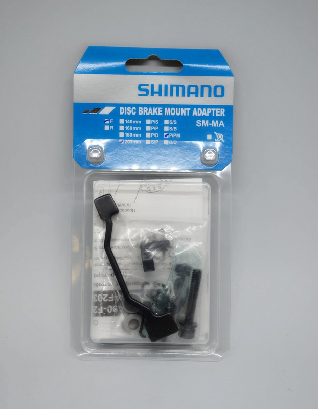 ADAPTER ZA DISK KOČNICU SHIMANO SM-MA-F203P/PM FIXING BOLT(LONG X1 SHORT X1) SNAP RING(NEW) X1 WASHER-A X2 WASHER-B X2 IND.PACK