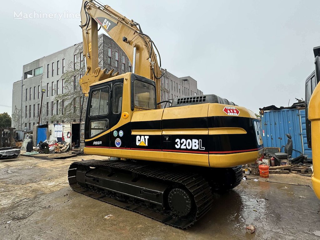 Caterpillar 320BL bager guseničar