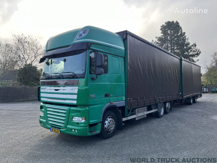 Prodaje se Burg DAF XF105 FAR SuperSpacecab 410 6X2S/R | 6x2 | Curtainside Volum kamion sa kliznom ceradom na aukciji + prikolica sa kliznom ceradom