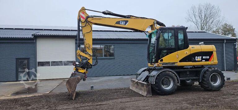 Bager na točkovima
Caterpillar M313 D