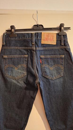 %1200 Nenošene Levis 516 XS