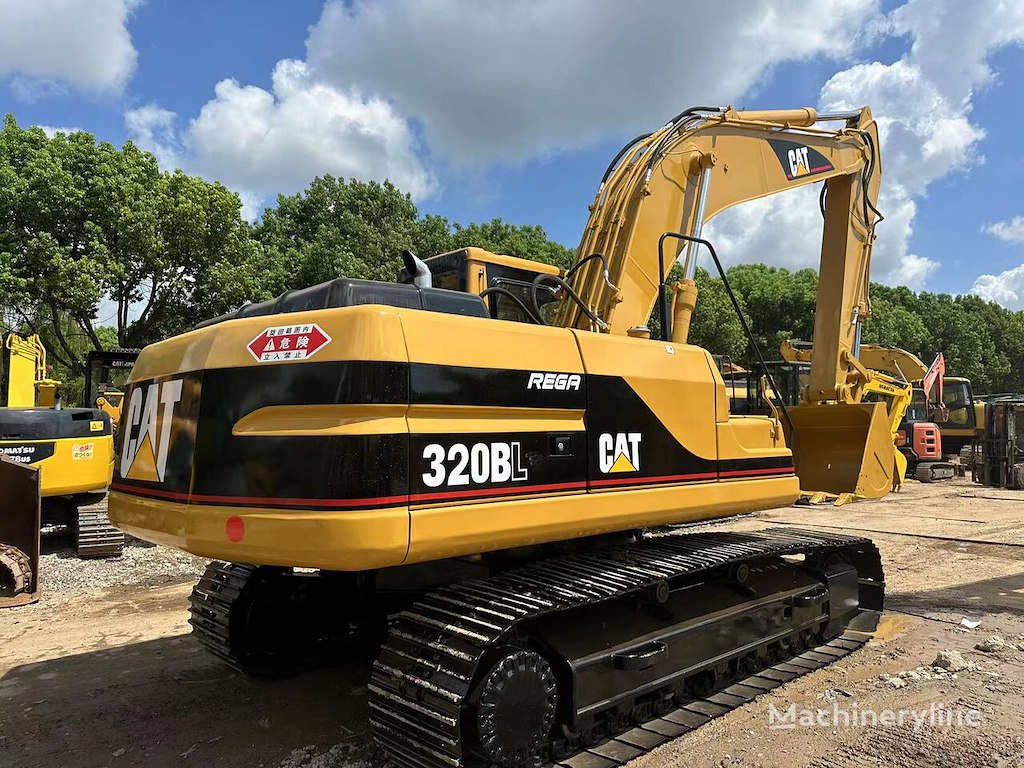 Caterpillar 320BL bager guseničar