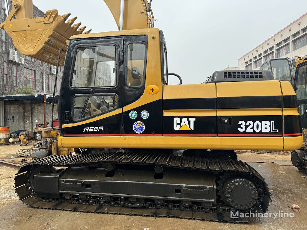 Caterpillar 320BL bager guseničar