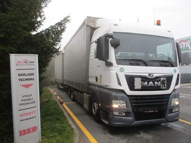 MAN TGX 24.460 kamion sa klizna zavesa cerada + prikolica sa kliznom ceradom