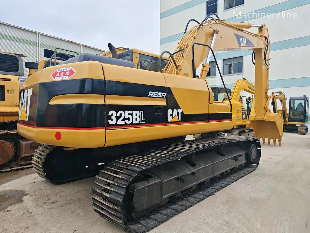 Caterpillar 325BL bager guseničar