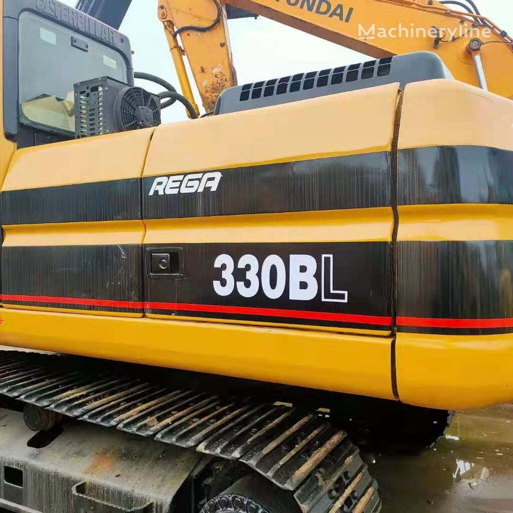 Caterpillar 330BL bager guseničar