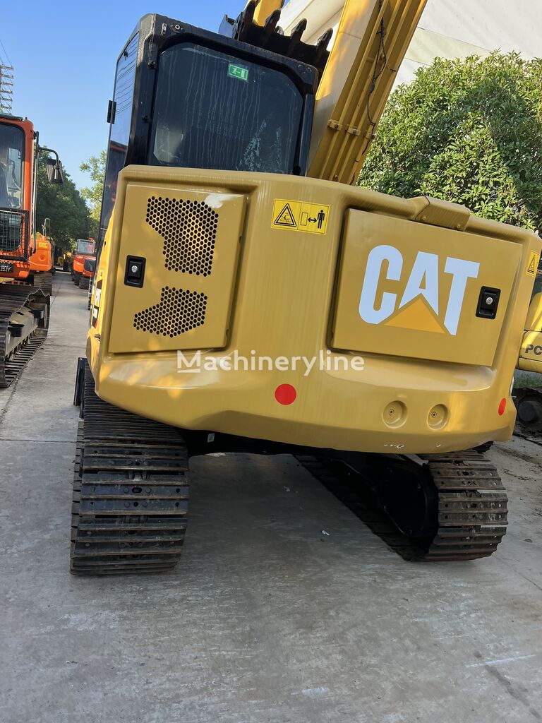 Caterpillar 310 bager guseničar