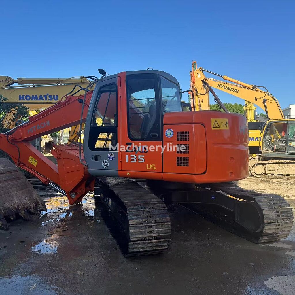 Hitachi ZX135US bager guseničar