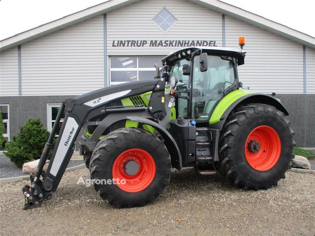 Claas AXION 830 CMATIC Med frontlæsser traktor točkaš