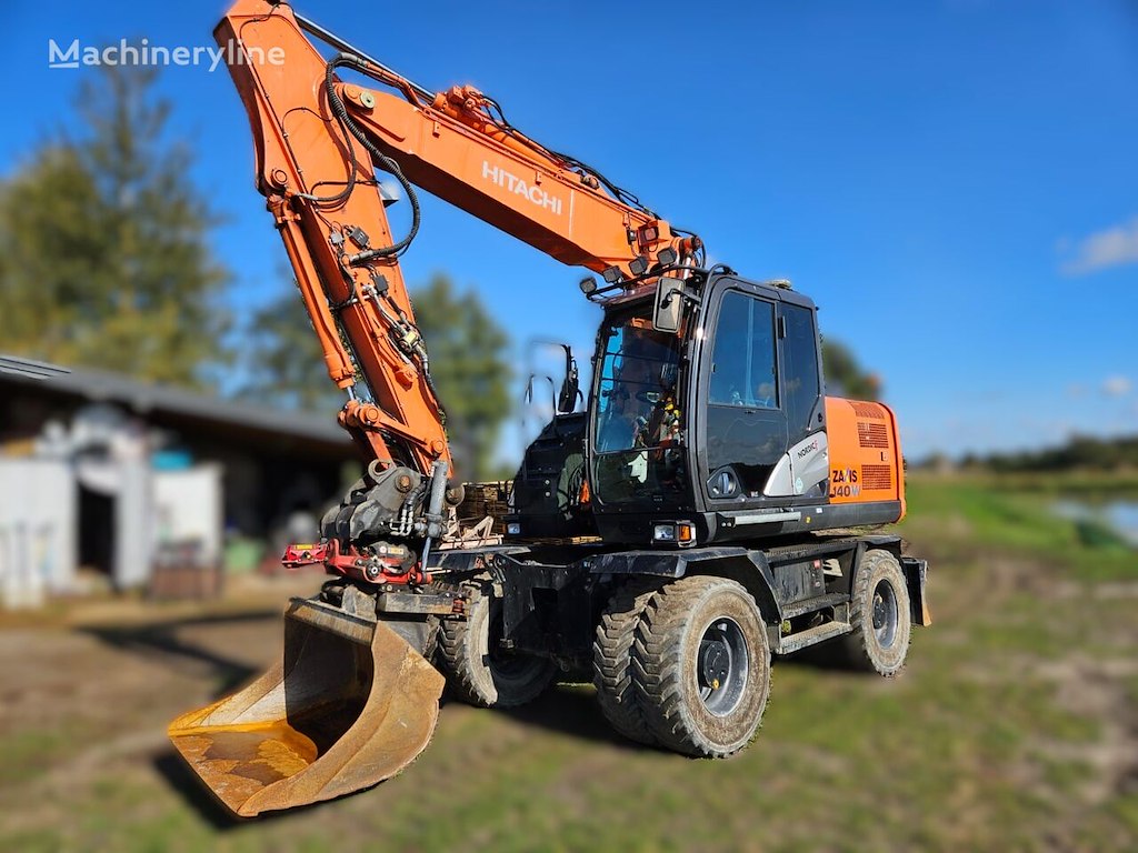 Hitachi ZX 140W bager točkaš