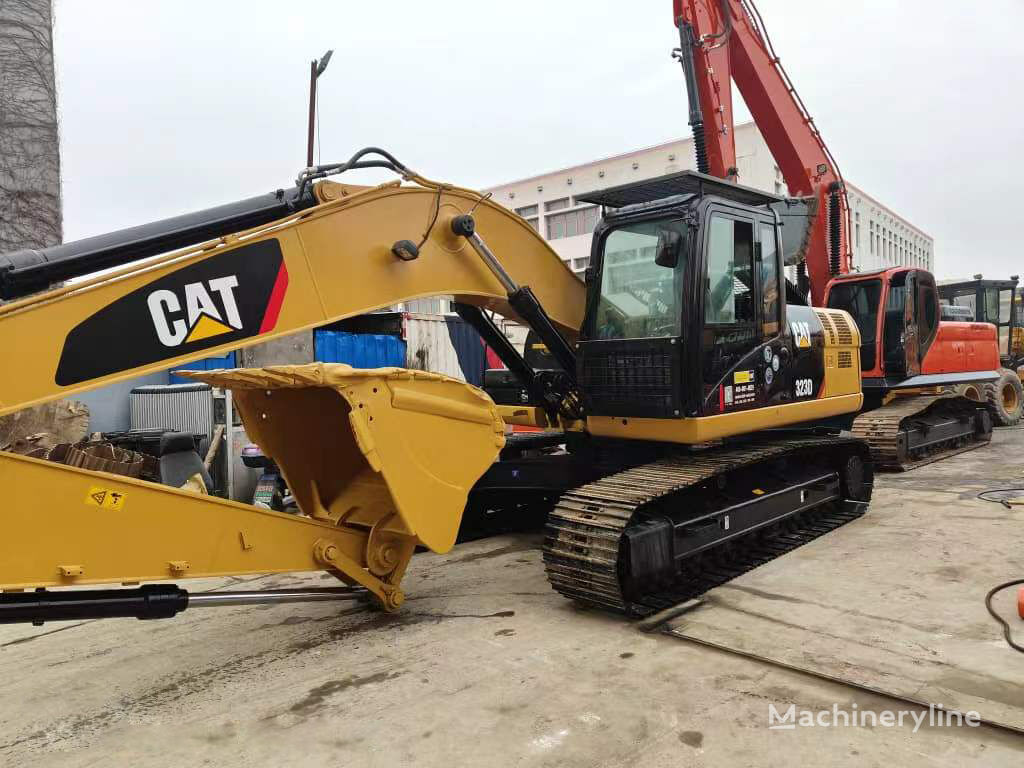 Caterpillar 323D bager guseničar