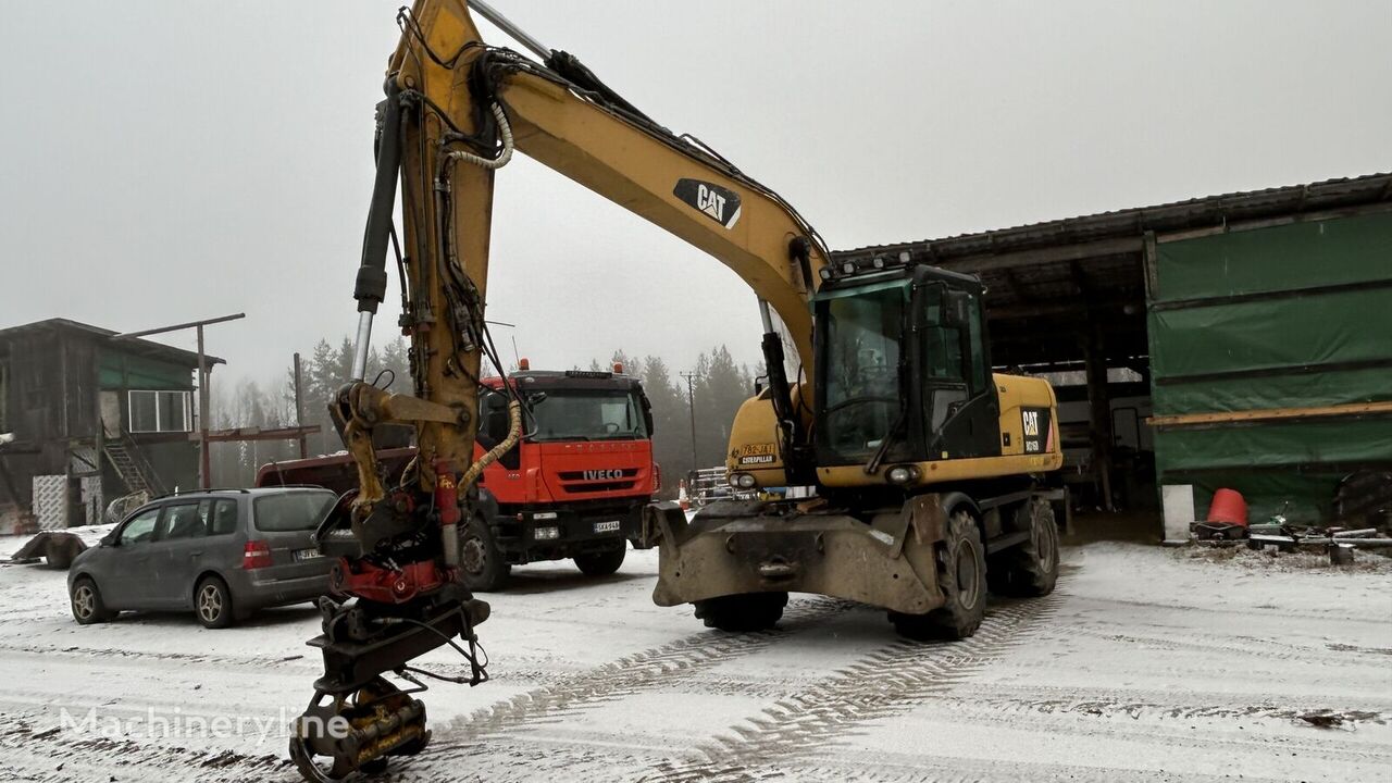 Caterpillar 316 D bager točkaš