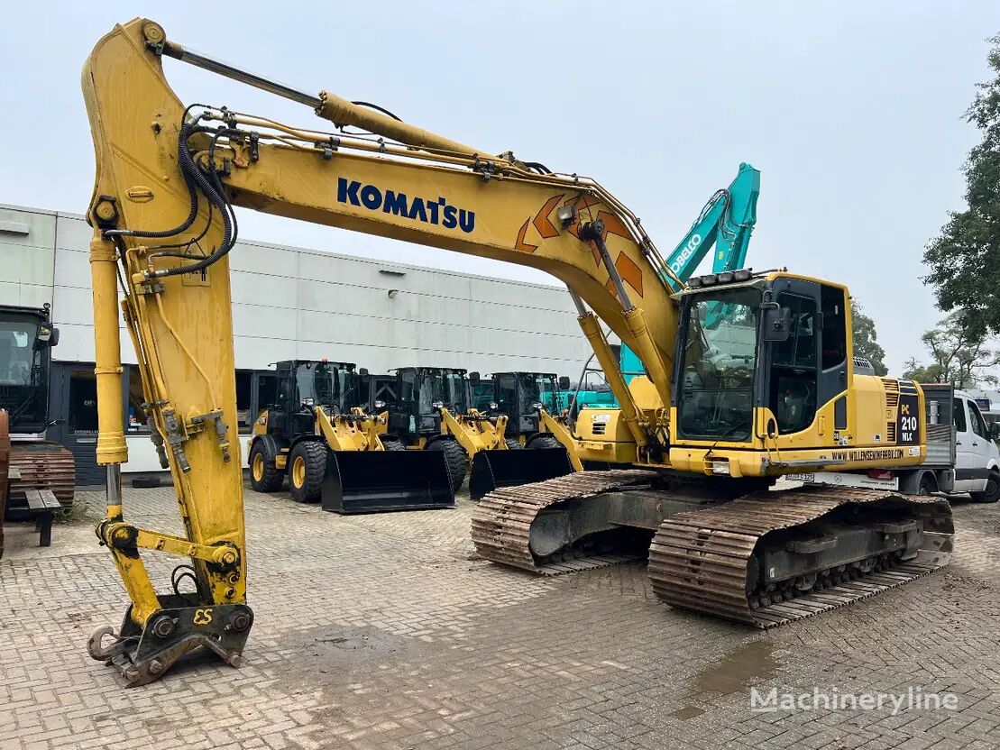 Komatsu PC210 (mozhlyvyi lizynh) bager guseničar