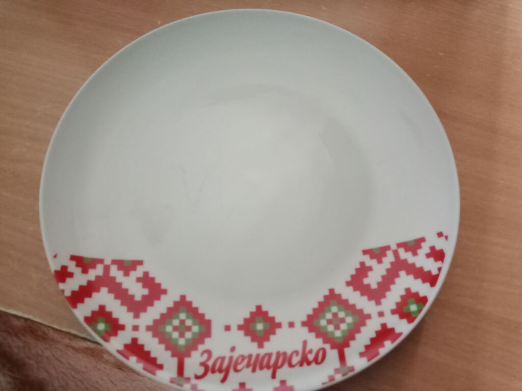 12kom. tanjira plitki 19cm prečnik. Lepi i retki tanjiri +otvarač za