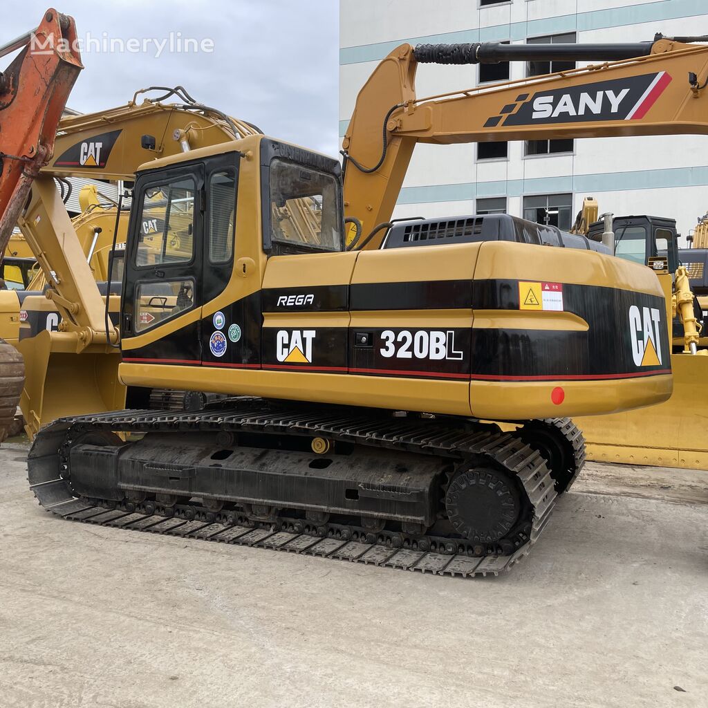 Caterpillar 320BL bager guseničar