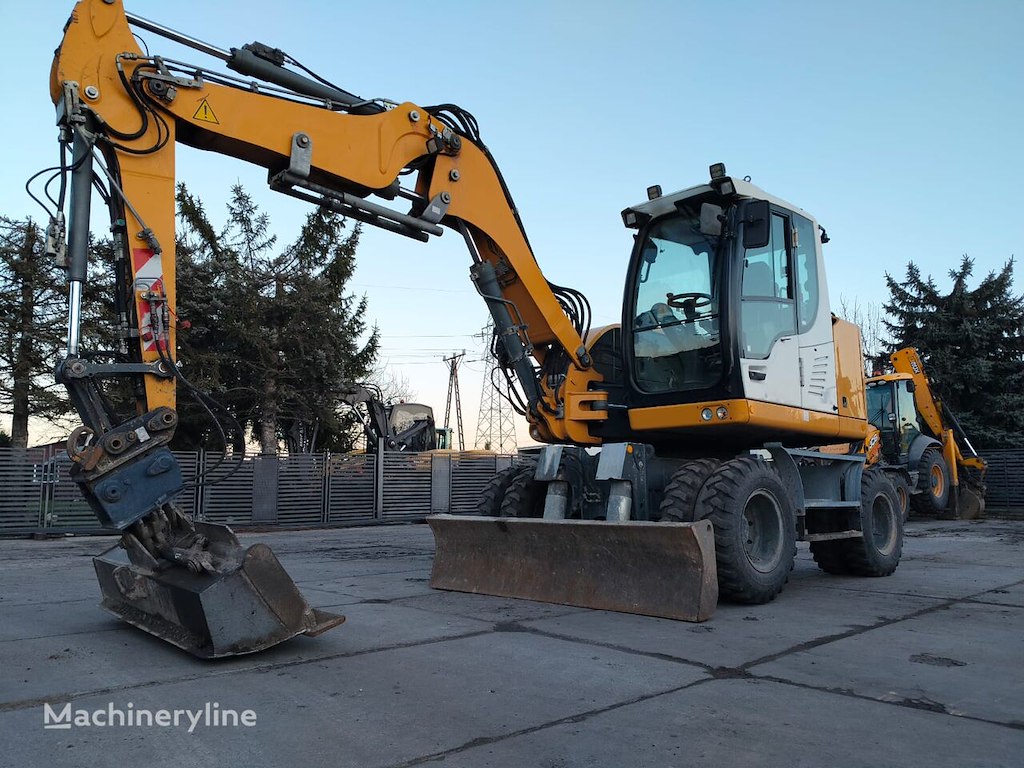 Liebherr 910 bager točkaš