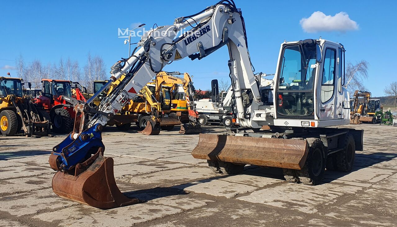 Liebherr A309 bager točkaš