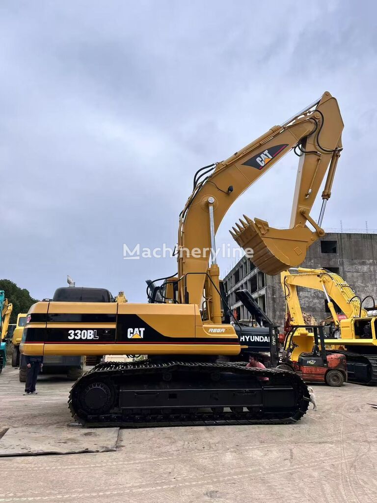 Caterpillar 330BL bager guseničar