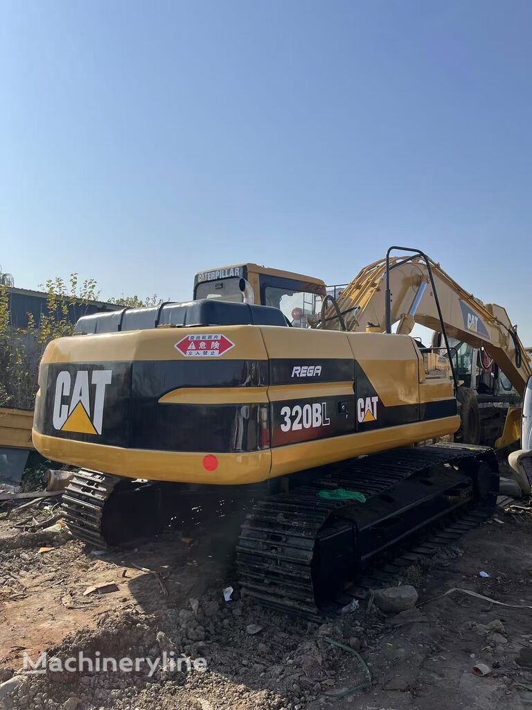 Caterpillar 320BL bager guseničar