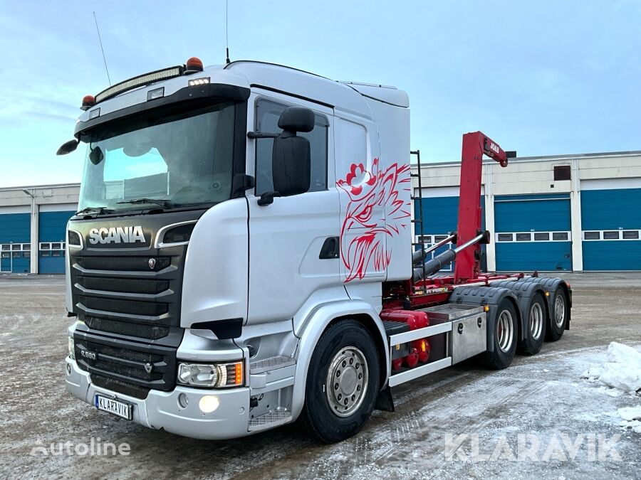 Prodaje se Scania R580 rol kiper sa kukom na aukciji