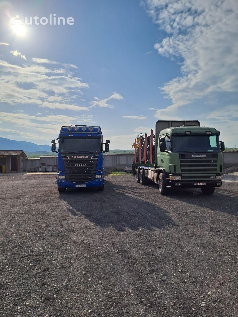 Scania V8 560 kamion za prevoz drva + šumarska prikolica