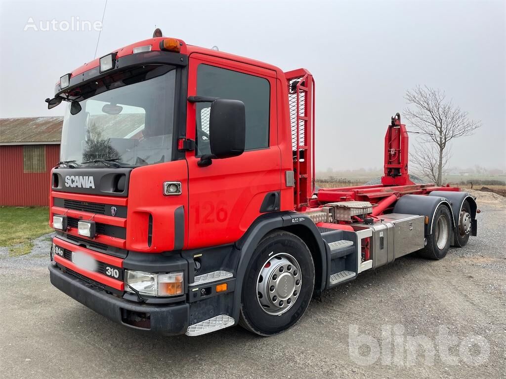 Prodaje se Scania P94DB6X2*4LB310 rol kiper sa kukom na aukciji