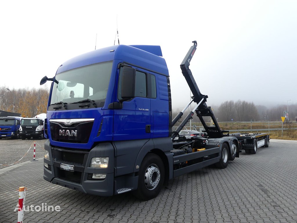 MAN TGX 26.400 kamion rol kiper + prikolica šasije