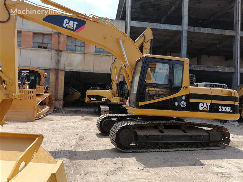 Caterpillar 330BL bager guseničar