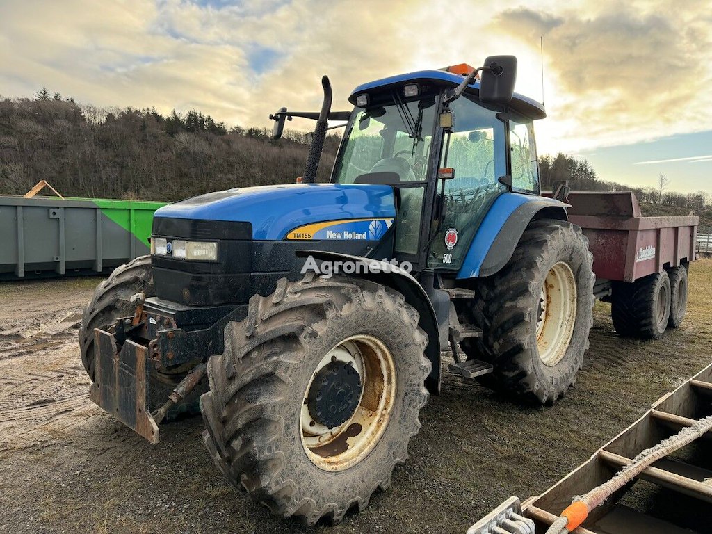 Prodaje se New Holland TM-155 / 4x4 / 8405 timer traktor točkaš na aukciji