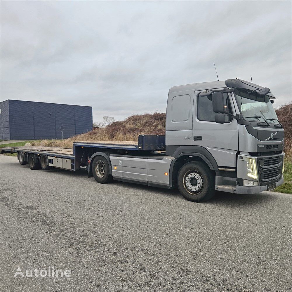 Prodaje se Volvo Fm-450 tegljač na aukciji + poluprikolica platforma