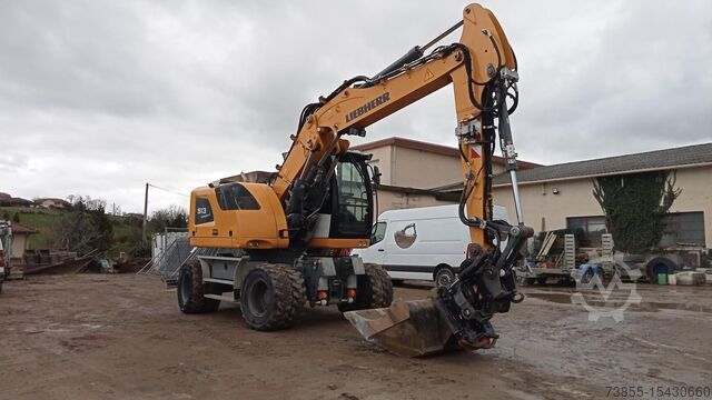 Mobilni bager
Liebherr A 913 Compact Litronic met OilQuick Rototilt, 6 emmers, palletvork en hammer