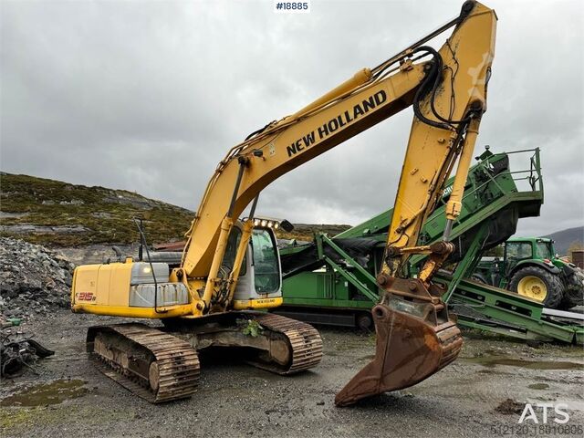 Bager za puzanje
New Holland Kobelco E215B Tracked excavator w/ digging bucket.