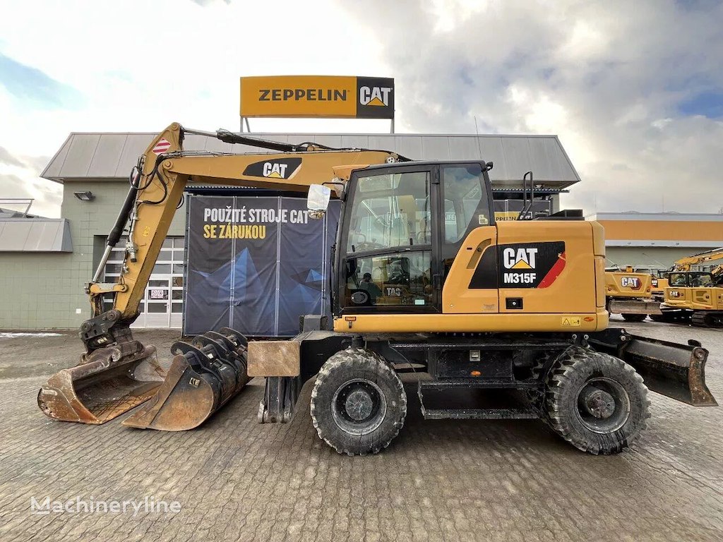 Caterpillar M315F bager točkaš