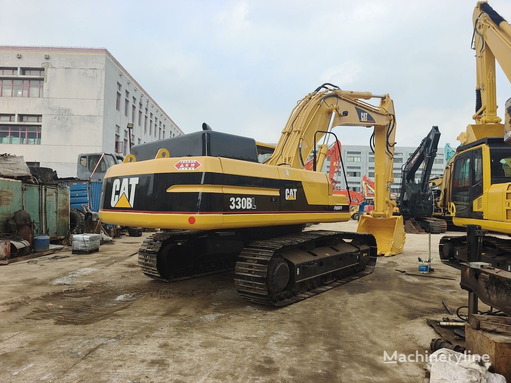 Caterpillar 330BL bager guseničar