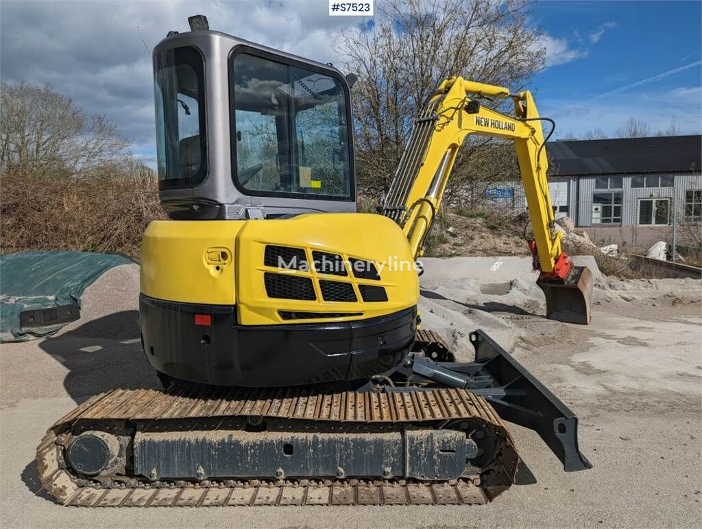 New Holland E502C bager guseničar