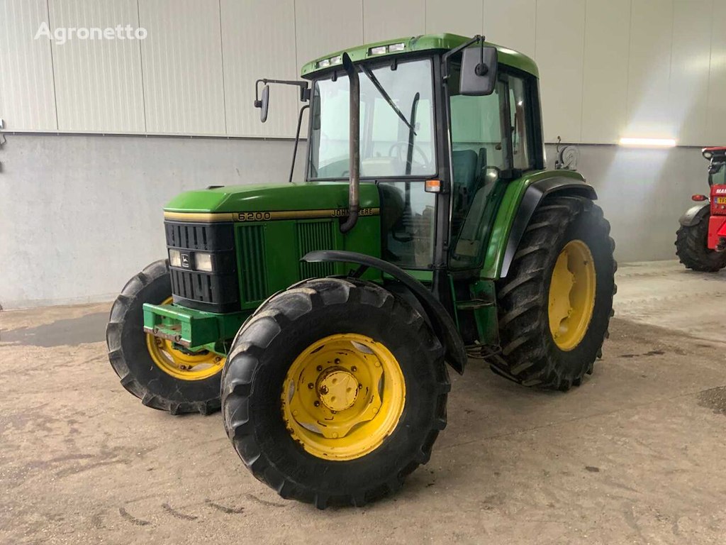 Prodaje se John Deere 6200 traktor točkaš na aukciji