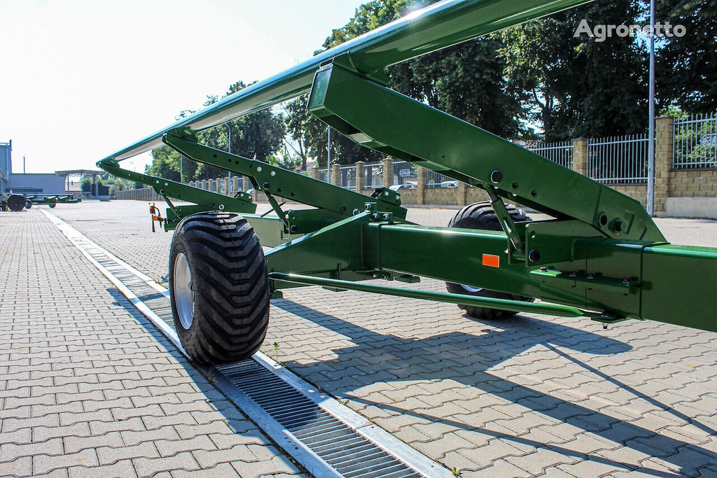 Nova Maans pidvyshchenoi mitsnosti dlia zhnyvarky John Deere T670 prikolica za žetelicu