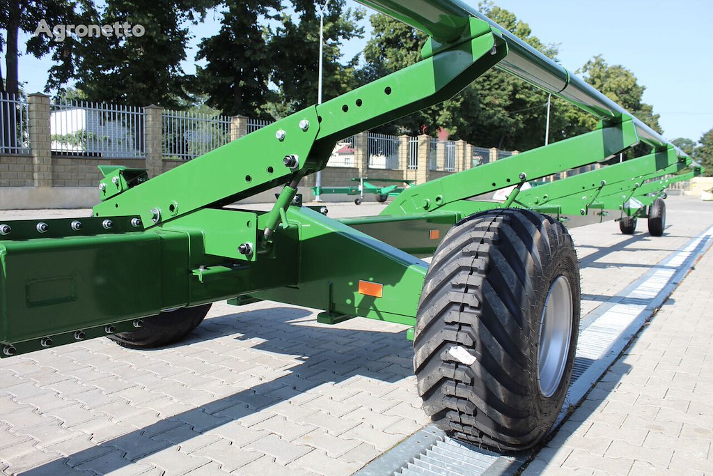 Nova Maans pidvyshchenoi mitsnosti dlia John Deere T660 prikolica za žetelicu