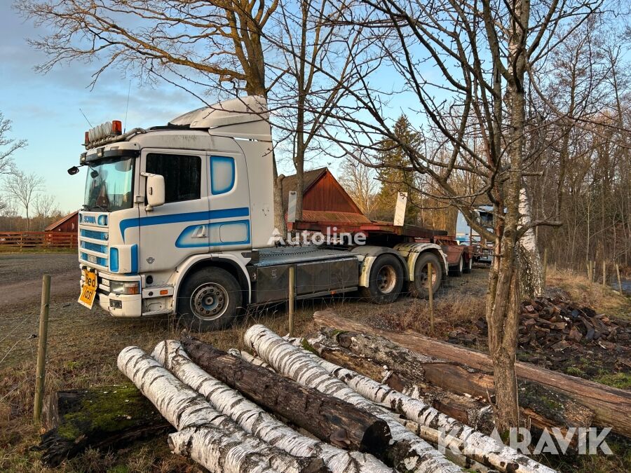 Prodaje se Scania 164G tegljač na aukciji + poluprikolica autotransportera