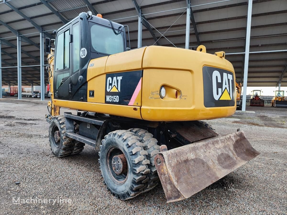 Caterpillar M315D bager točkaš