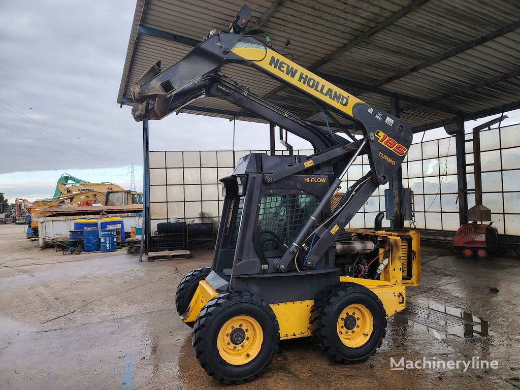 New Holland L185 mini utovarivač