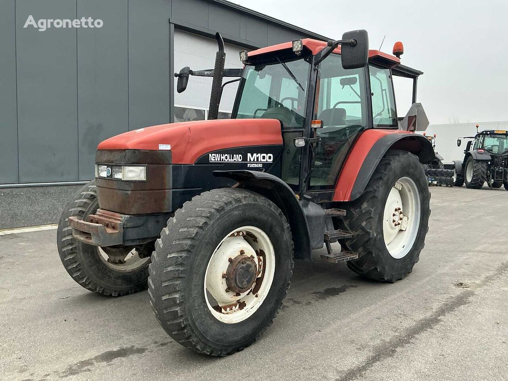 Prodaje se New Holland M100 traktor točkaš na aukciji