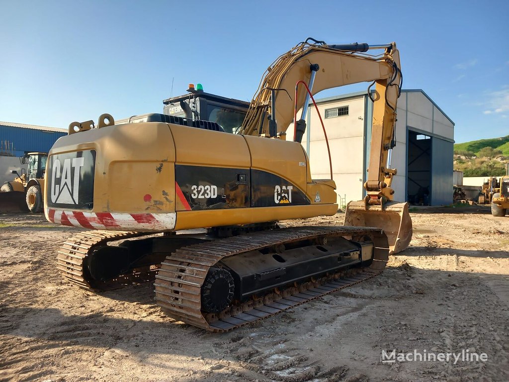 Caterpillar 323DL bager guseničar