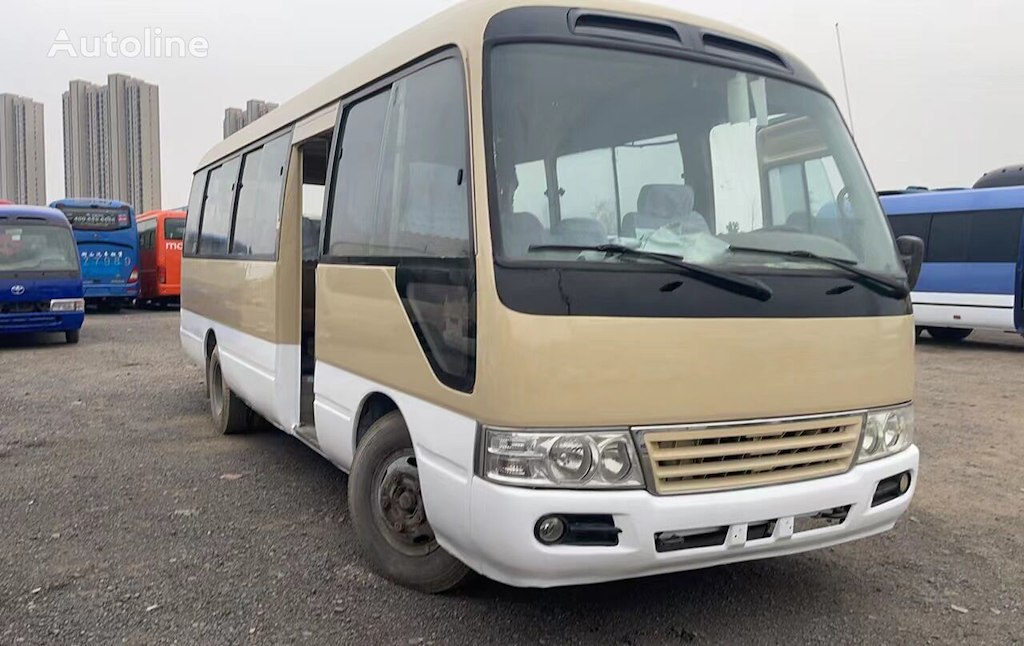 Toyota used coaster bus in stock for sale in shanghai prigradski autobus