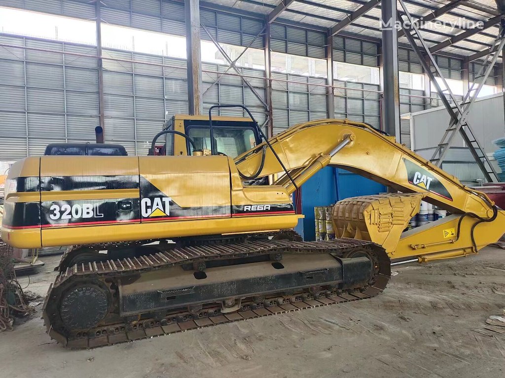 Caterpillar 320BL bager guseničar