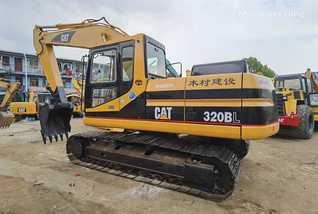 Caterpillar 320BL bager guseničar