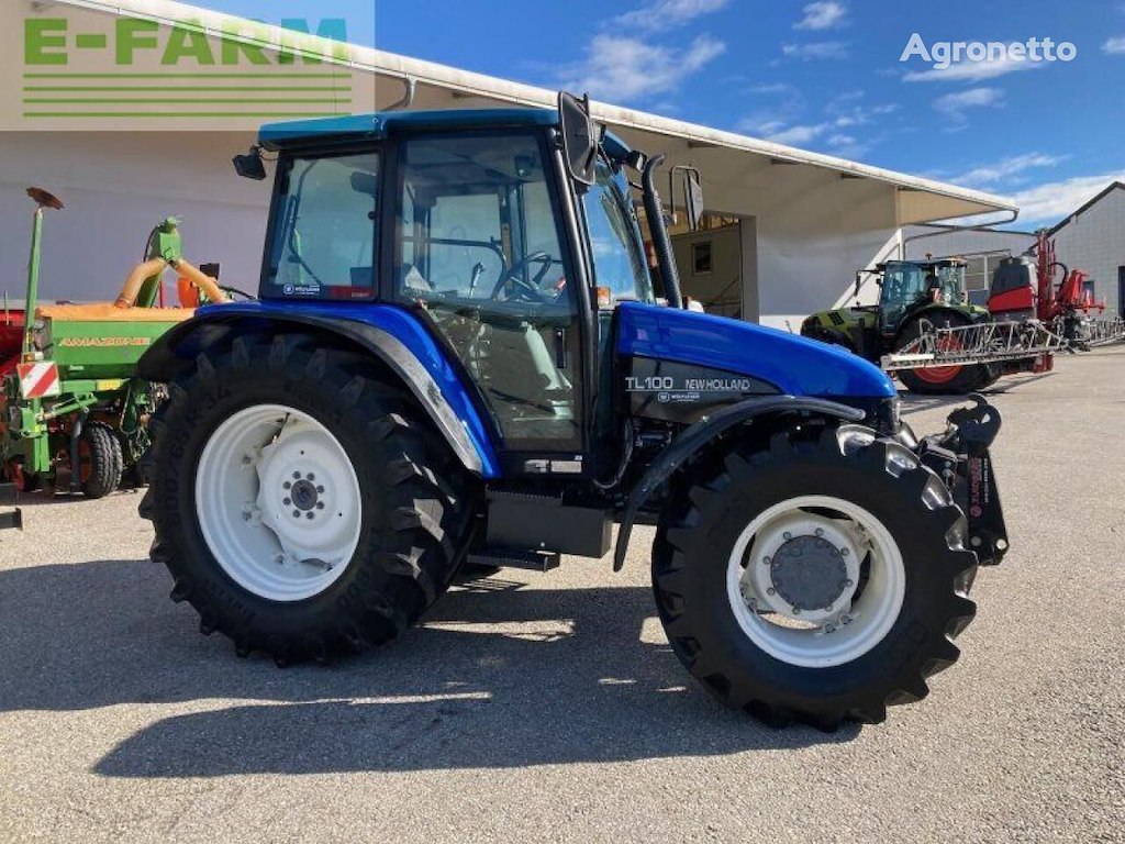 New Holland tl 100 traktor točkaš