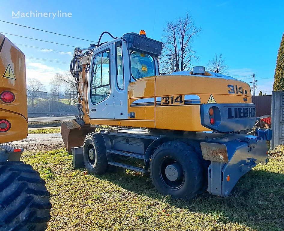 Liebherr A314 bager točkaš